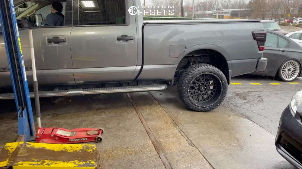 2017 Nissan Titan XD with 22x12 -51 Vision Rocker 412 and 33/12.5R22 ...