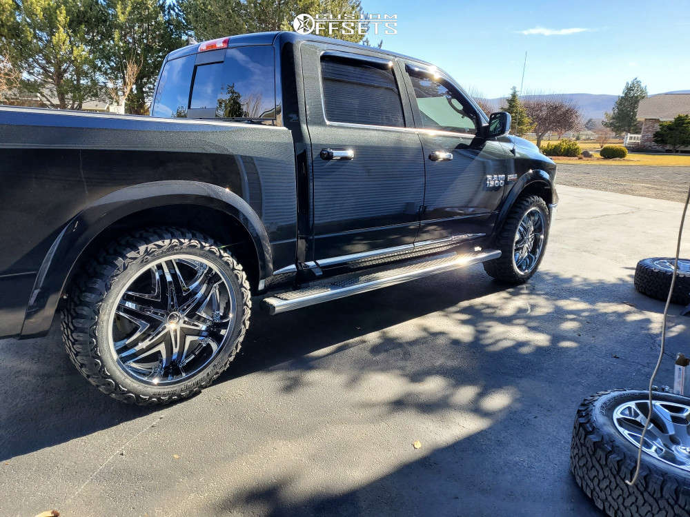 2017 Ram 1500 with 24x10 12 Diablo Elite and 35/12.5R24 Haida Mud Champ ...