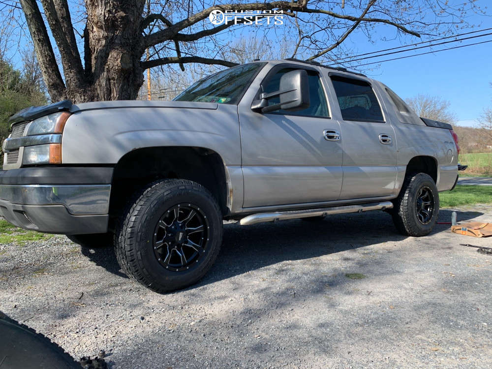 2004 Chevrolet Avalanche 1500 with 17x9 -12 Moto Metal Mo970 and 32/10 ...