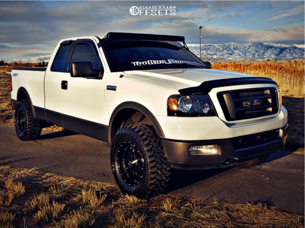 2004 Ford E-150 with 18x9 -12 Fuel Hostage and 33/12.5R18 Mark Ma Darkar Mt3 and Leveling Kit ...