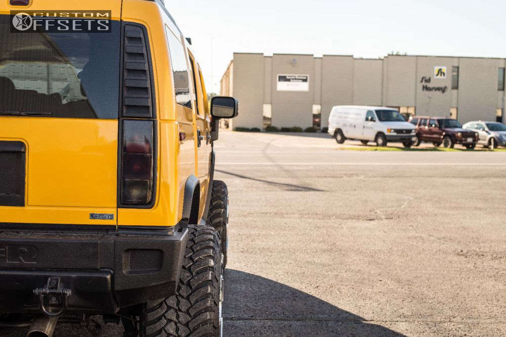 2005 Hummer H2 with 22x14 -76 Hostile Knuckles and 325/50R22 AMP Mud ...