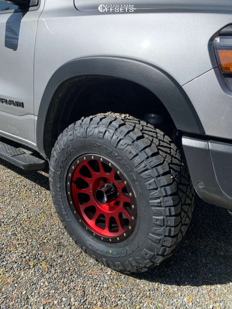 2019 Ram 1500 with 18x9 -12 Method MR305 and 295/70R18 Nitto Ridge ...