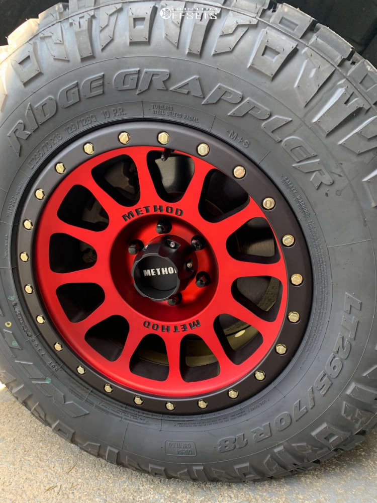 2019 Ram 1500 with 18x9 -12 Method MR305 and 295/70R18 Nitto Ridge ...