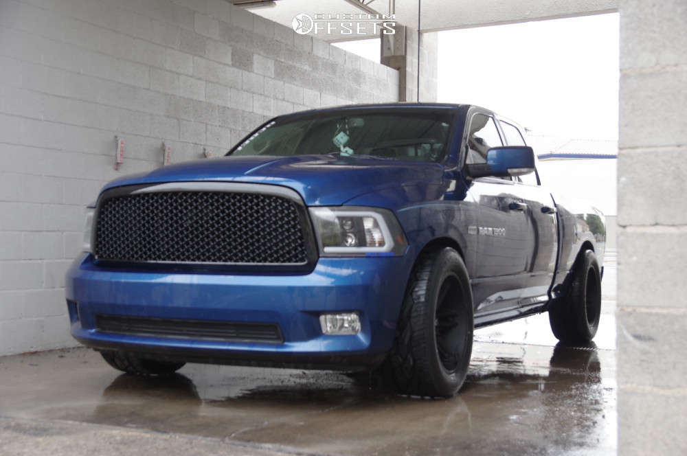 2011 Ram 1500 with 20x10 -25 Vision Razor and 305/50R20 Nitto Nt420v ...