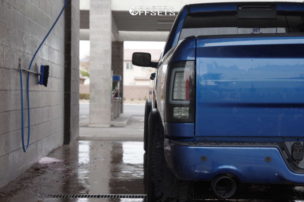 2011 Ram 1500 with 20x10 -25 Vision Razor and 305/50R20 Nitto Nt420v ...