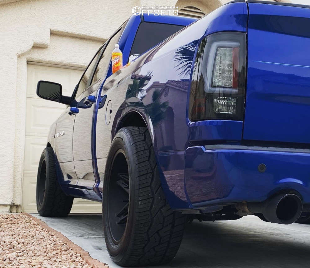 2011 Ram 1500 with 20x10 -25 Vision Razor and 305/50R20 Nitto Nt420v ...
