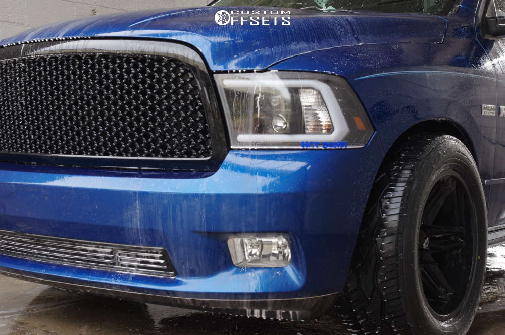 2011 Ram 1500 with 20x10 -25 Vision Razor and 305/50R20 Nitto Nt420v ...