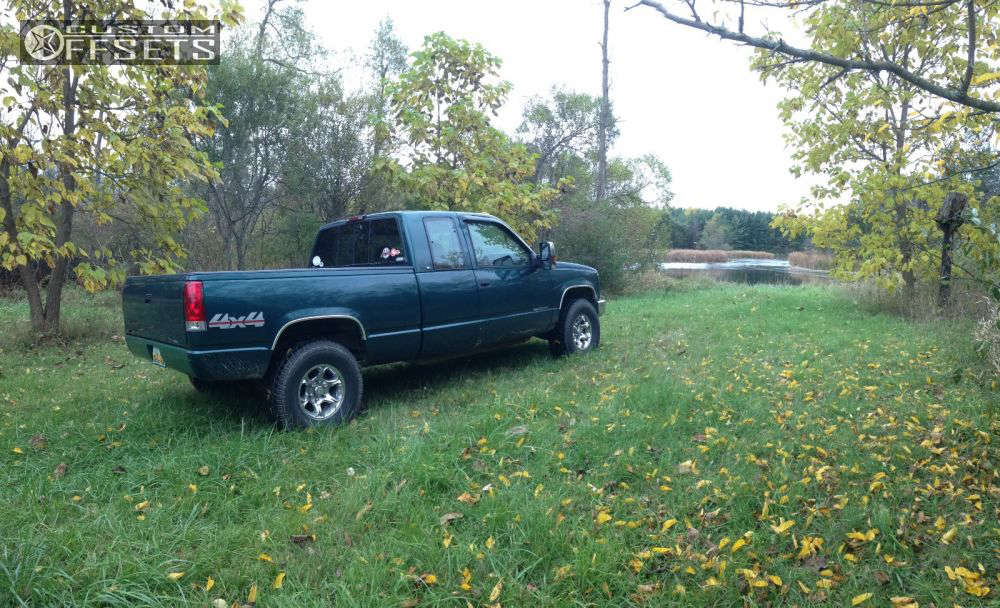 1997 GMC K1500 with 16x8 0 American Racing Python and 285/75R16 Toyo ...