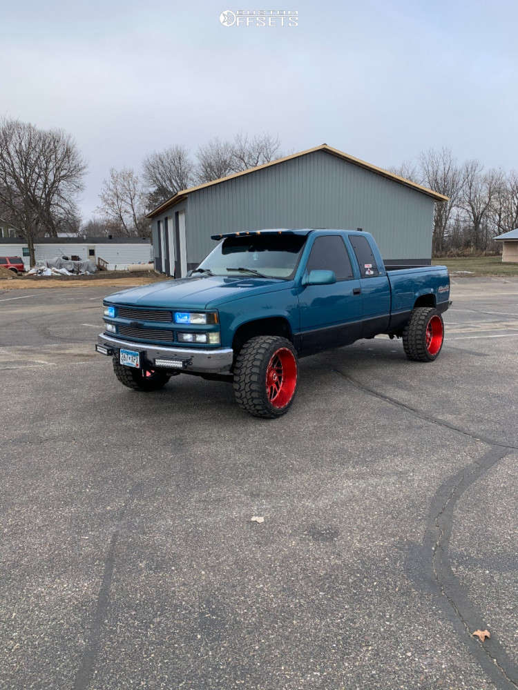 1997 Chevrolet K1500 with 22x12 -44 TIS 544RM and 33/12.5R22 Gladiator ...