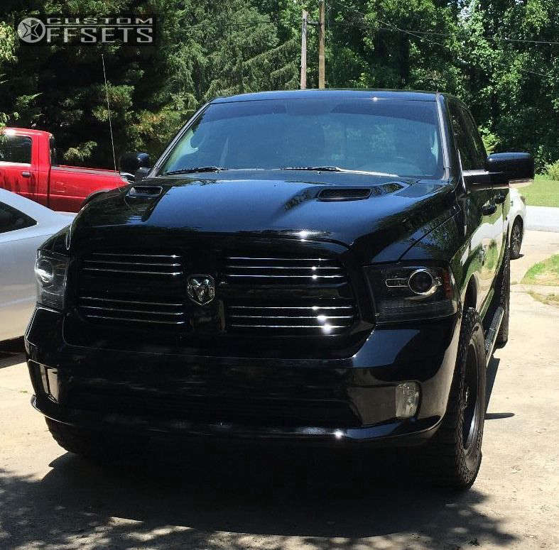 2014 Ram 1500 with 20x9 1 Fuel Maverick D538 and 35/12.5R20 Mickey ...