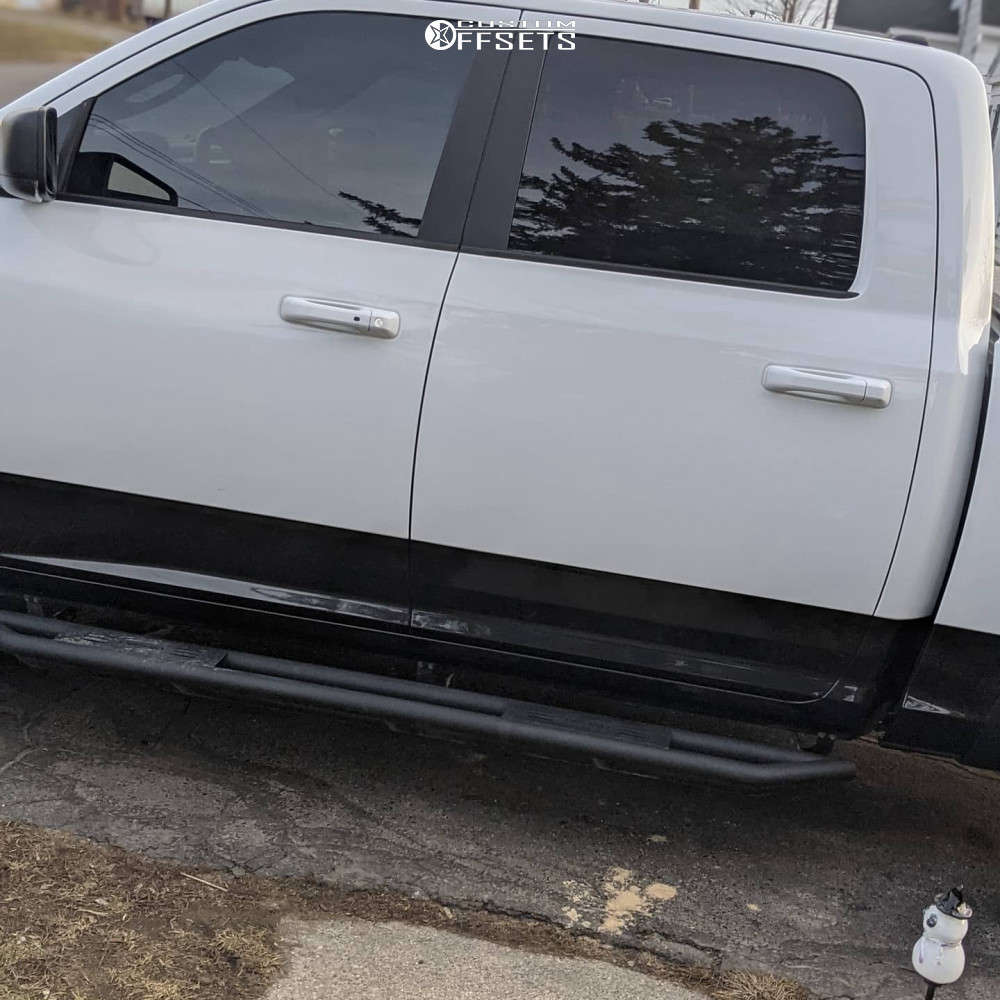 2017 Ram 1500 with 22x12 -44 Xtreme Mudder Xm-327 and 33/12.5R22 Venom ...