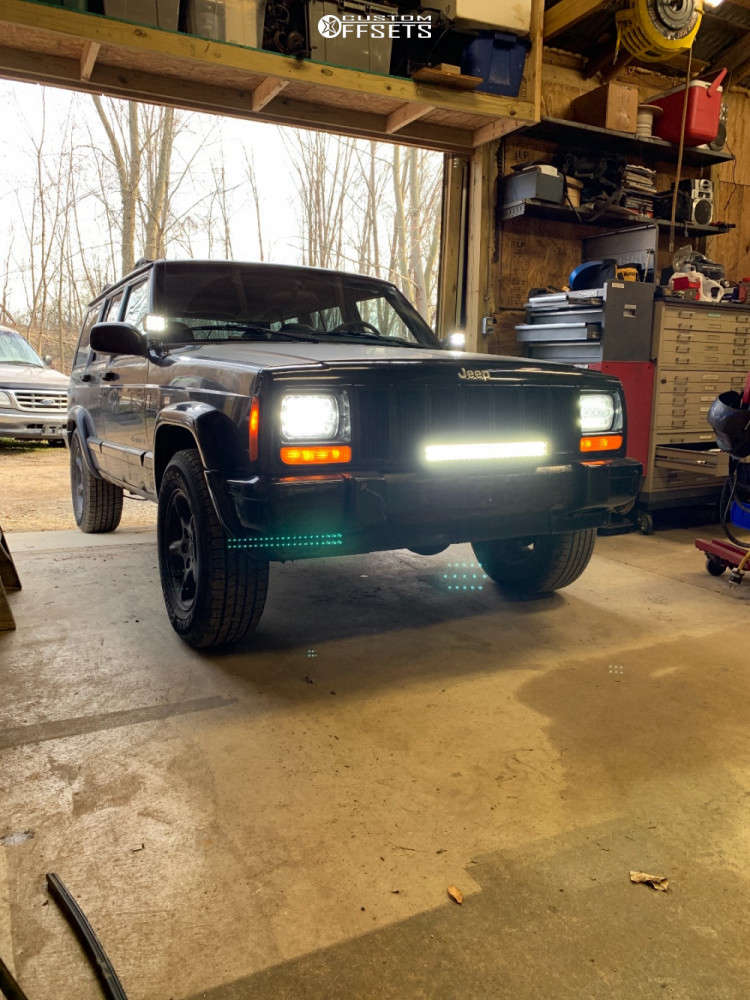 2001 Jeep Cherokee with 15x10 0 Pro Comp 51 and 33/12.5R15 Mastercraft ...