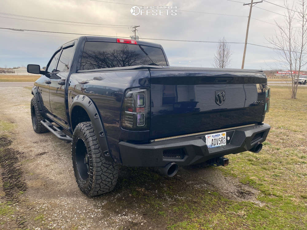 2017 Ram 1500 with 20x10 -25 Remington 8-point and 35/12.5R20 Nitto ...
