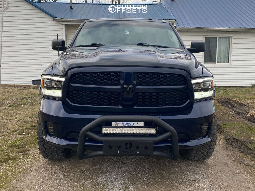 2017 Ram 1500 with 20x10 -25 Remington 8-point and 35/12.5R20 Nitto ...