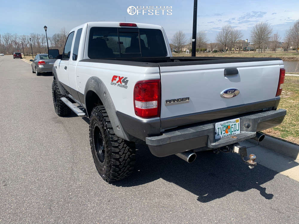 2006 Ford Ranger with 17x9 -12 KMC XD131 RG1 and 295/70R17 Yokohama ...