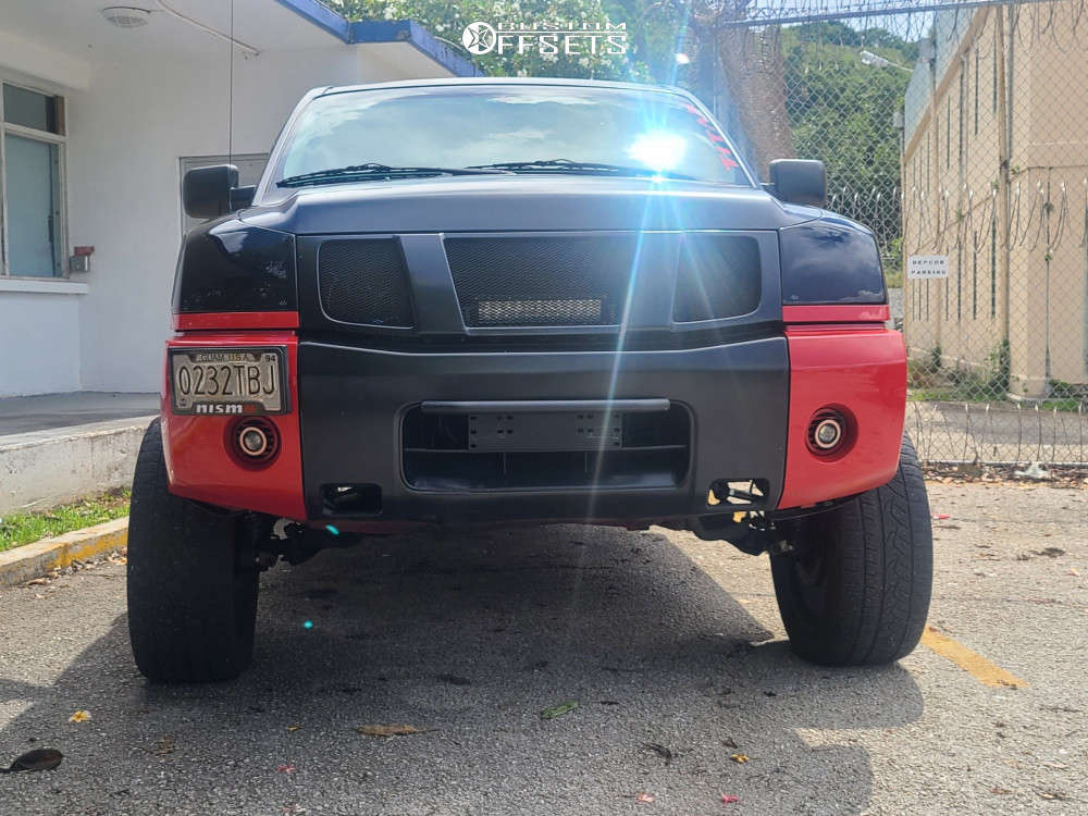 2007 Nissan Titan with 22x10 -24 Fuel Hostage and 33/12.5R22 Renegade ...