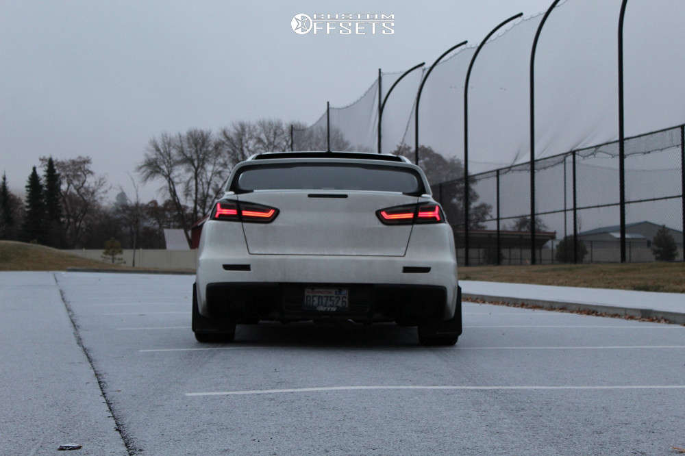 2015 Mitsubishi Lancer with 18x9.5 15 Enkei T6s and 265/35R18 Nitto ...