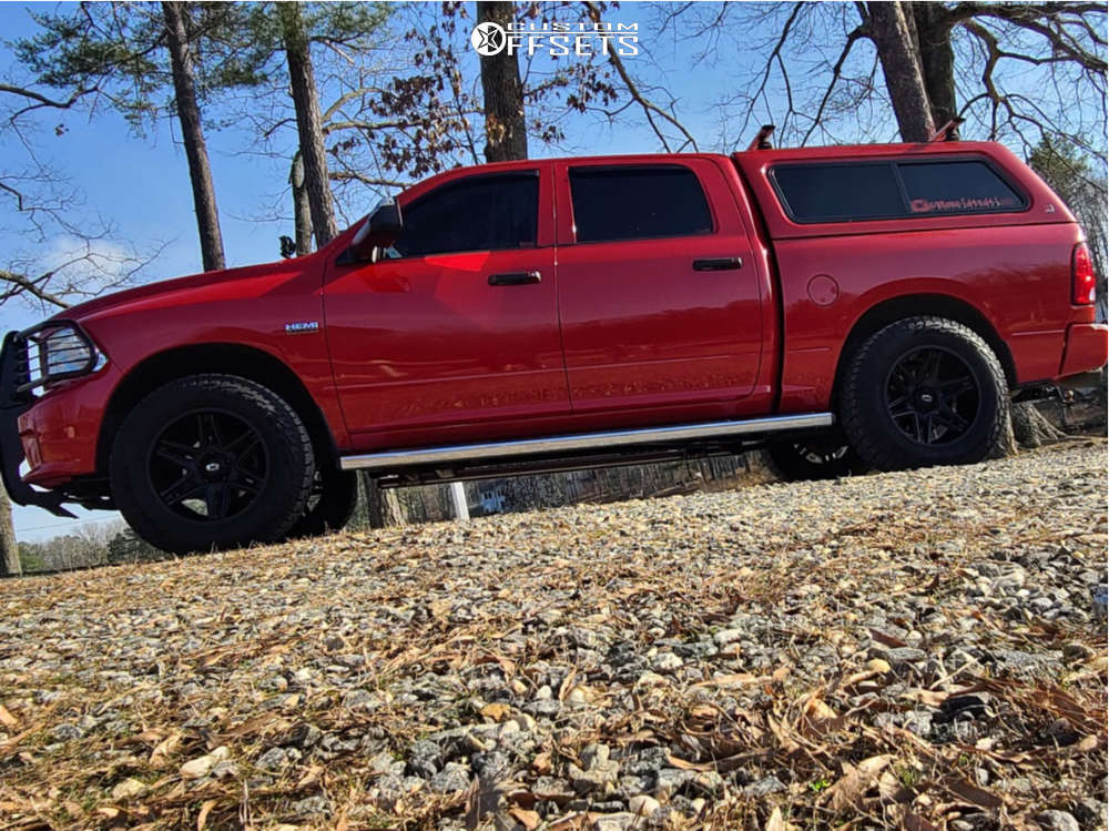 2014 Ram 1500 with 20x10 -25 Vision Razor and 285/65R20 Falken WildPeak ...