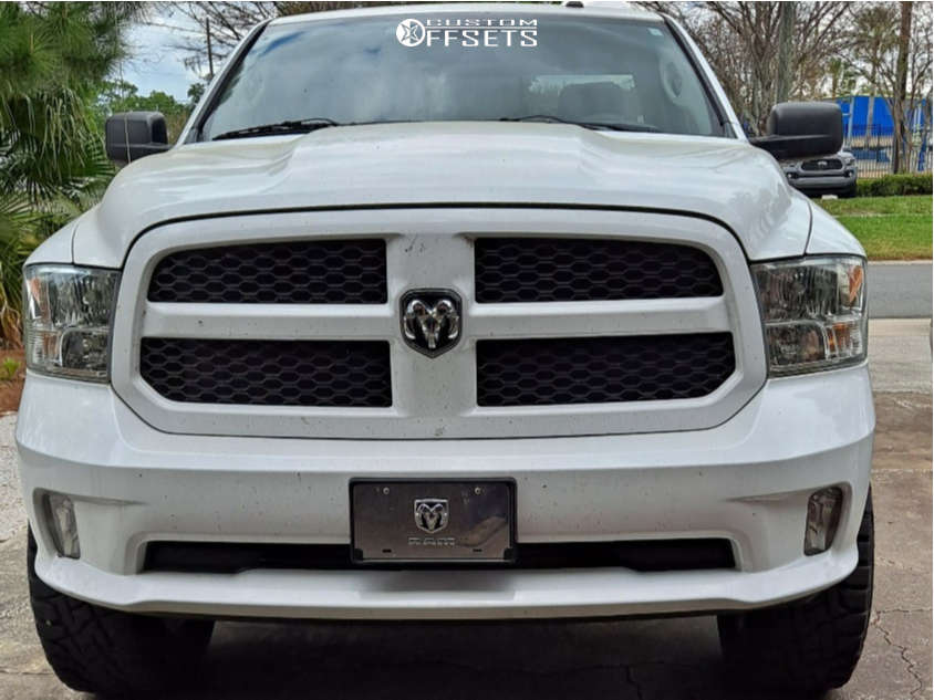 2015 Ram 1500 with 20x10 -25 Vision Bomb and 35/12.5R20 Toyo Tires Open ...