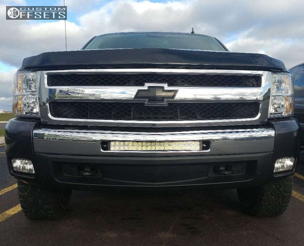 2010 Chevrolet Silverado 1500 with 17x9 -6 Pro Comp Series 69 and 265 ...