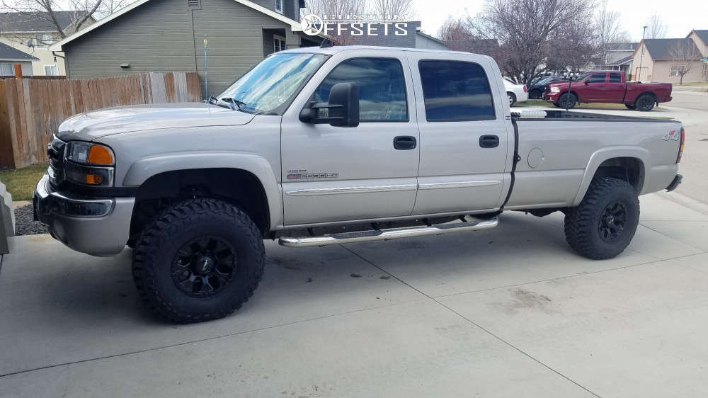 2006 GMC Sierra 2500 HD with 16x9 -12 Helo He878 and 33/12.5R16 ...