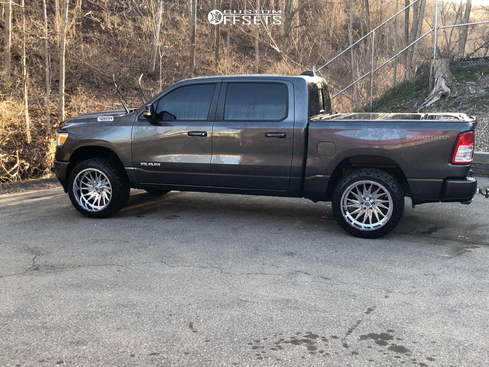 2020 Ram 1500 with 22x12 -44 TIS 547C and 33/12.5R22 Nitto Ridge ...