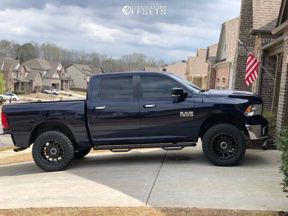 2017 Ram 1500 with 20x10 -24 Method Mr605 and 35/12.5R20 Nitto Ridge ...