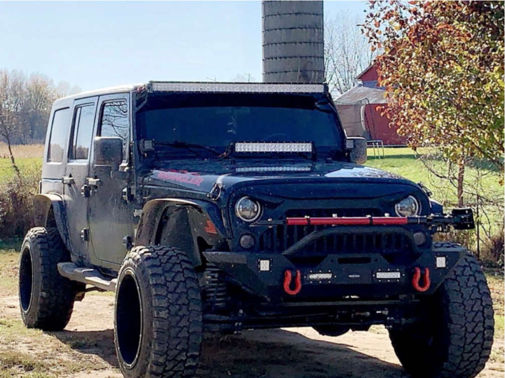 2007 Jeep Wrangler with 20x12 -44 Vision Rocker 412 and 33/12.5R20 Fury ...