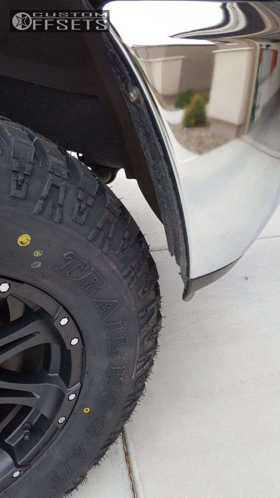 2015 Ram 3500 with 18x9 -6 Raceline Raptor and 305/70R18 Kanati Trail ...