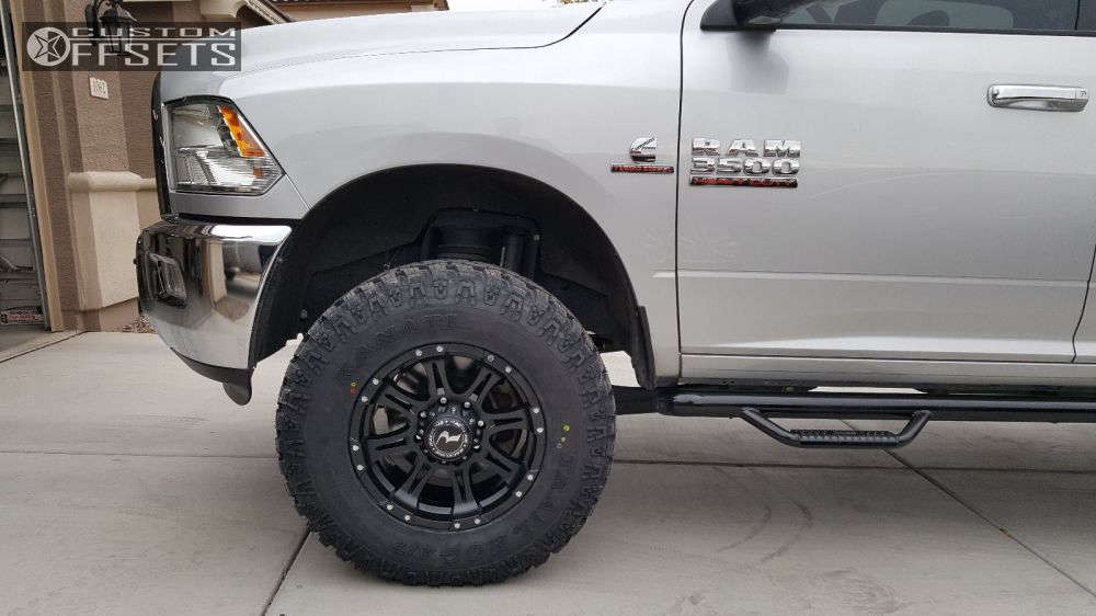 2015 Ram 3500 with 18x9 -6 Raceline Raptor and 305/70R18 Kanati Trail ...