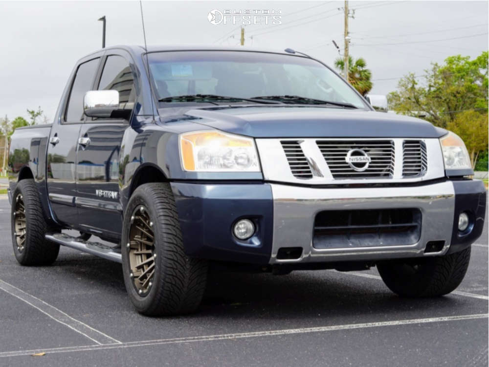 2014 Nissan Titan with 20x10 -25 Vision Creep and 305/50R20 Atturo ...
