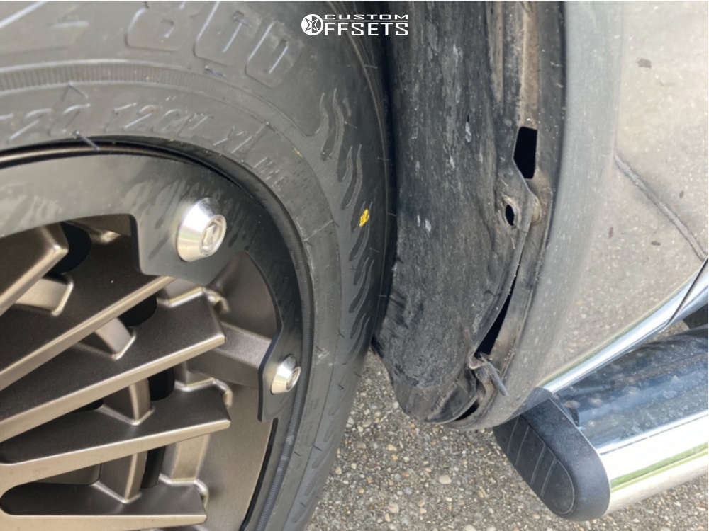 2014 Nissan Titan with 20x10 -25 Vision Creep and 305/50R20 Atturo ...