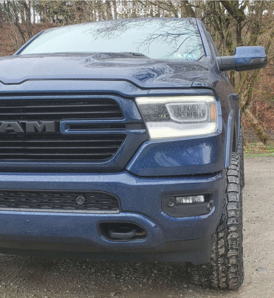 2020 Ram 1500 with 20x10 -18 Fuel Siege and 305/55R20 Cooper Discoverer ...