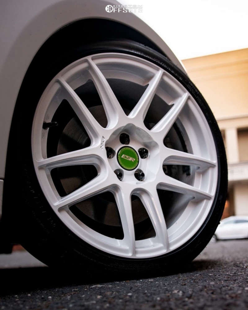 2015 Ford Focus with 18x8.5 40 ESR Cs8 and 225/40R18 Nitto Neo Gen and ...