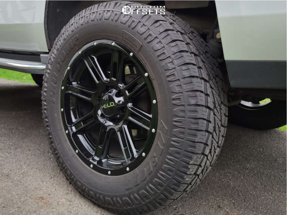 2015 GMC Yukon with 20x10 -24 Helo He900 and 35/12.5R20 Pro Comp A/t ...