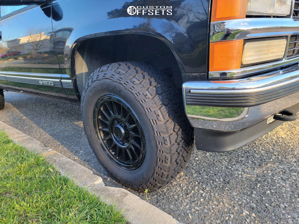 1998 Chevrolet K1500 with 17x8 20 KMC Km542 and 265/70R17 General Atx ...