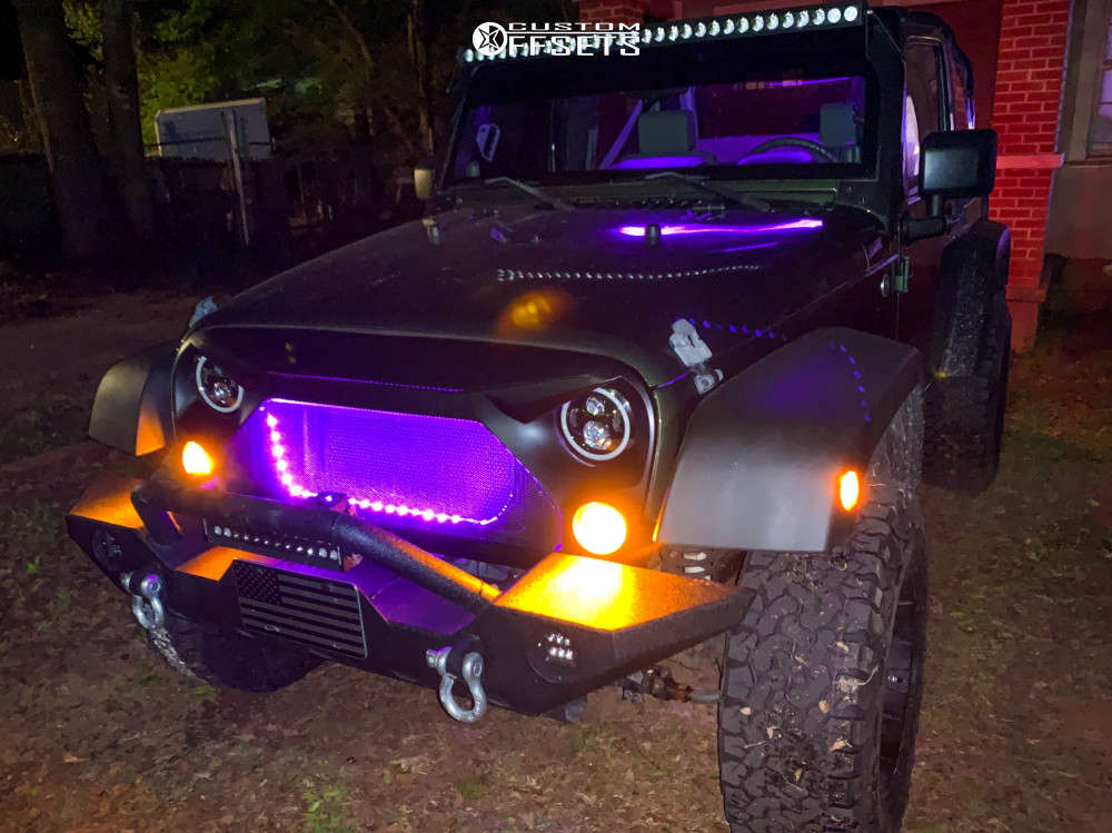 2009 Jeep Wrangler JK with 17x9 0 Pro Comp Series 89 and 33/12.5R17 ...