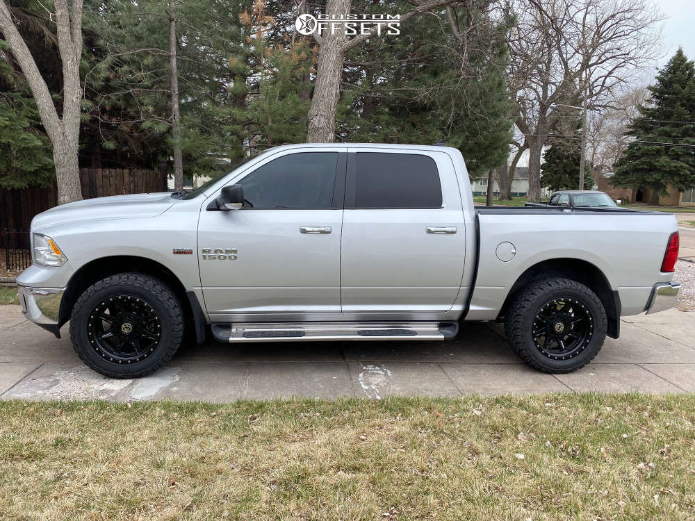 2014 Ram 1500 with 20x10 -18 Anthem Off-Road Rogue and 33/12.5R20 ...