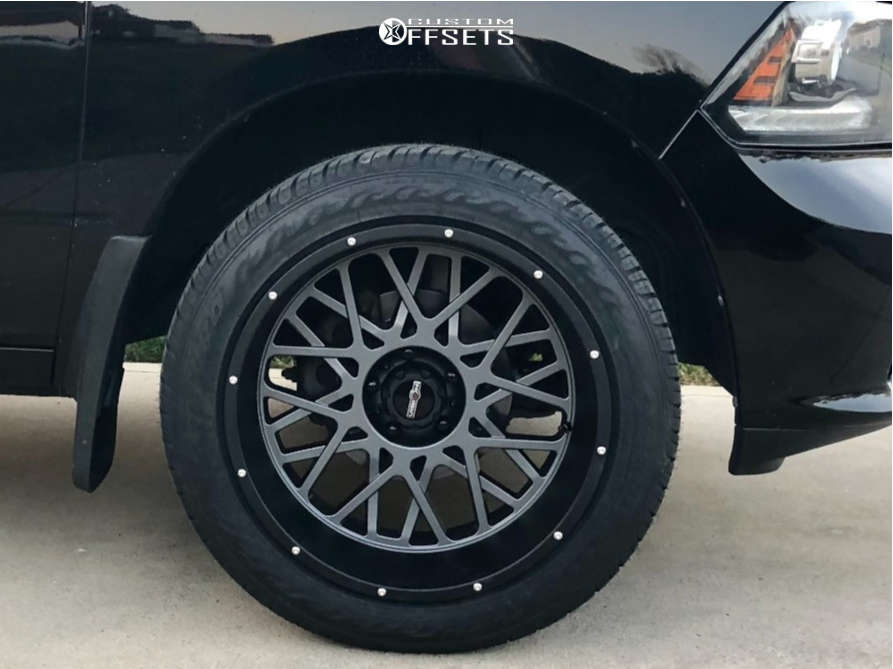 2014 Ram 1500 with 22x12 -52 Vision Rocker 412 and 33/12.5R22 Atturo ...