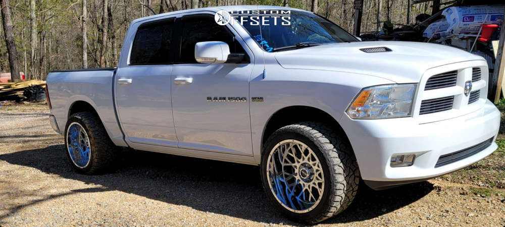 2011 Ram 1500 with 22x12 -51 Vision Rocker 412 and 33/12.5R22 Cooper ...