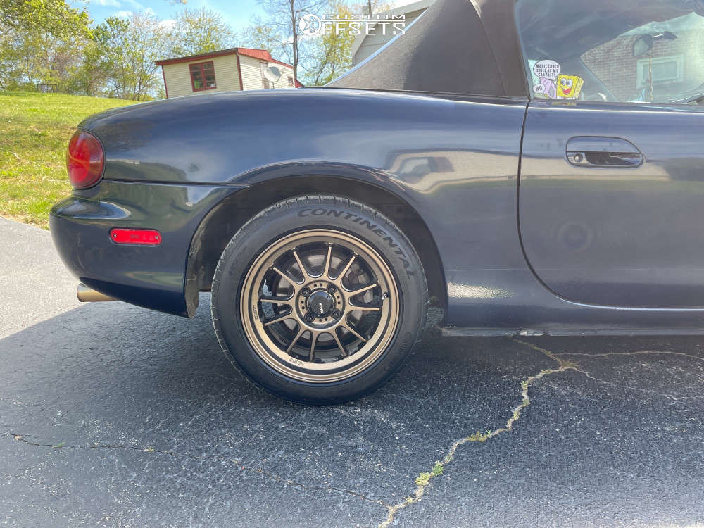 1999 Mazda Miata with 15x7.5 35 Konig Hypergram and 205/50R15 ...