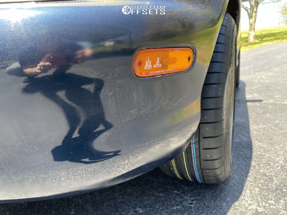 1999 Mazda Miata with 15x7.5 35 Konig Hypergram and 205/50R15 ...