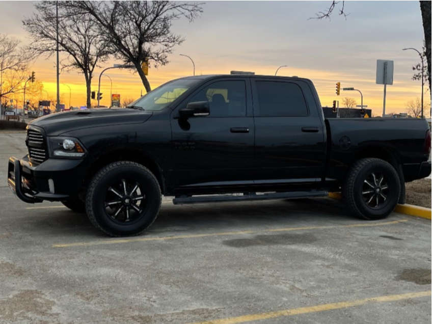 2017 Ram 1500 with 20x10 -24 Mayhem Beast and 33/10.5R20 Sumitomo ...