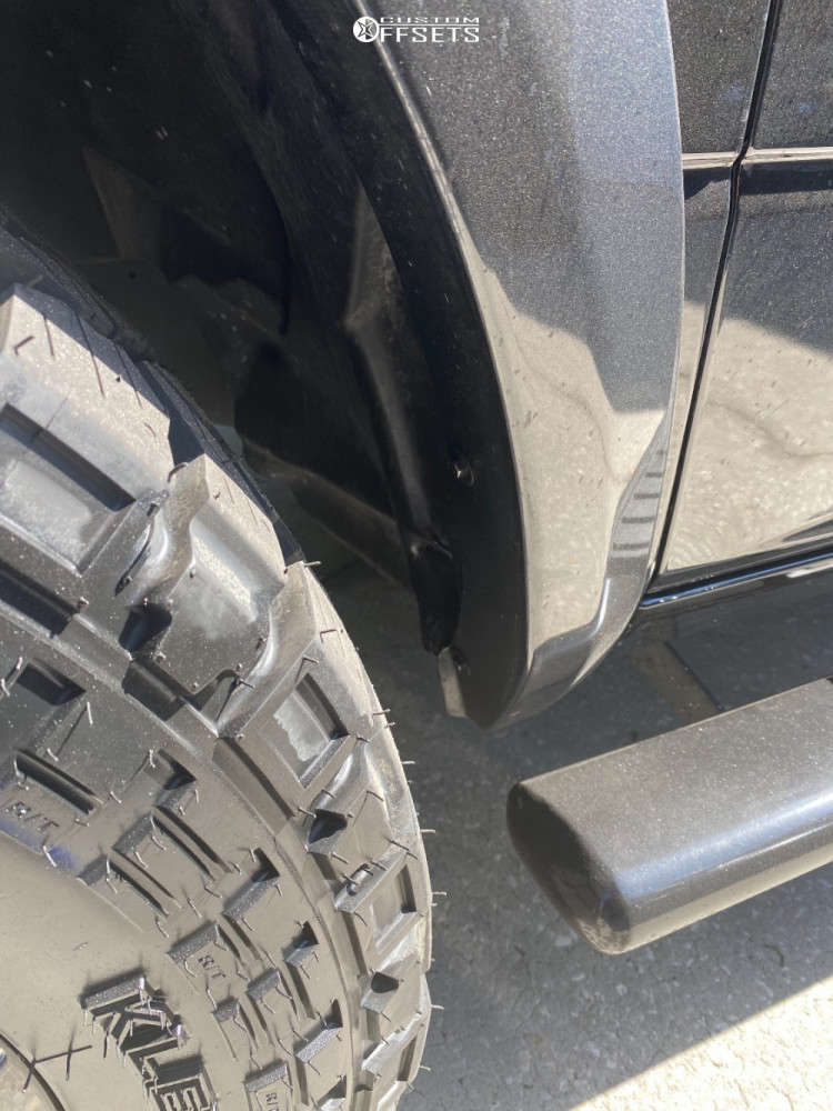 2015 Ram 1500 with 20x10 -19 Hardrock Spine Xposed and 35/12.5R20 Kenda ...