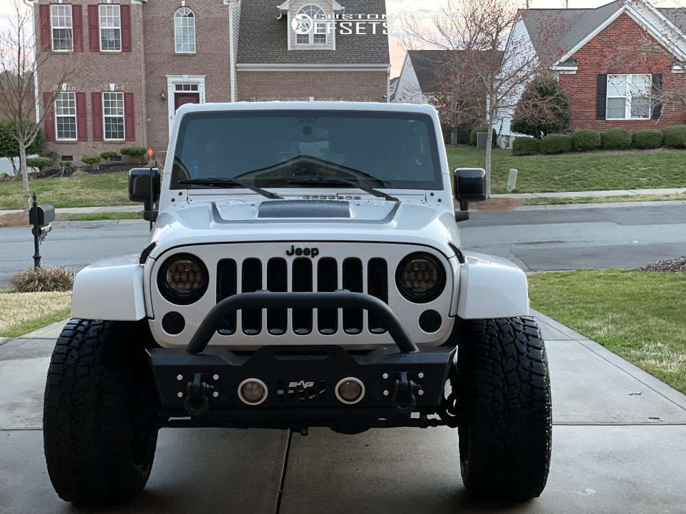 2015 Jeep Wrangler JK with 22x12 -44 RBP 77r and 35/12.5R22 Venom Power ...