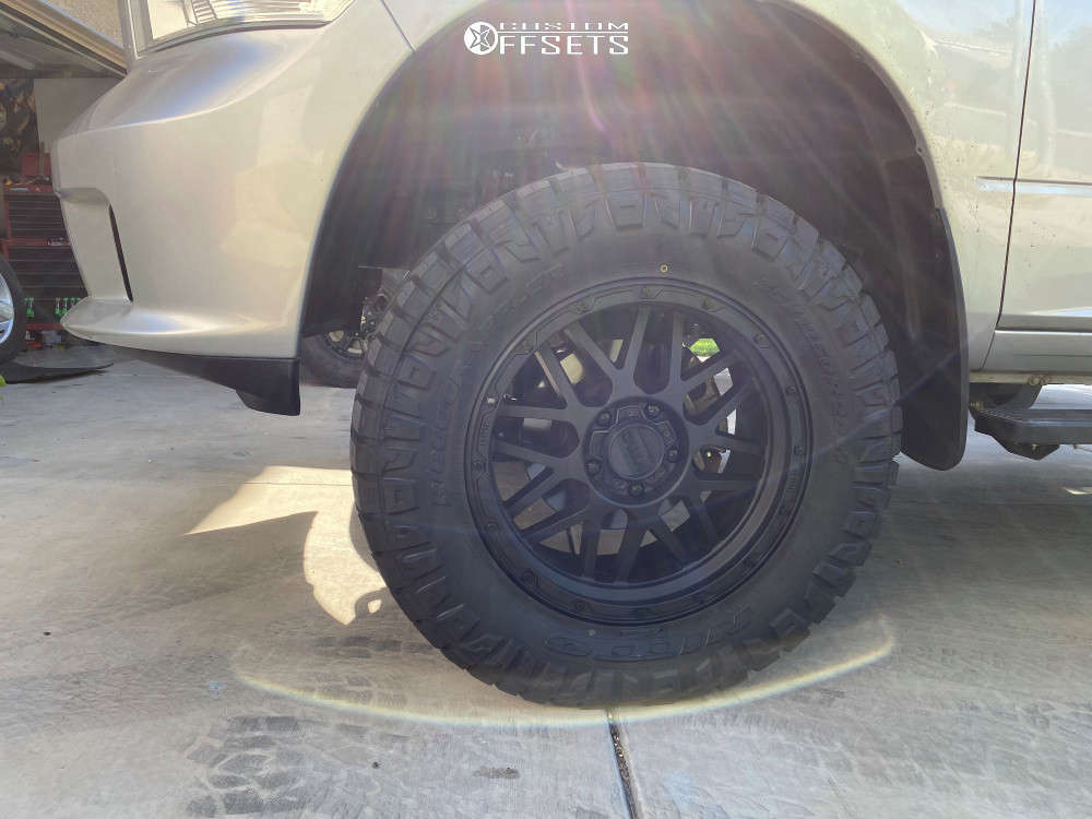 2013 Ram 1500 with 20x9 18 KMC KM535 and 35/12.5R20 Nitto Ridge ...