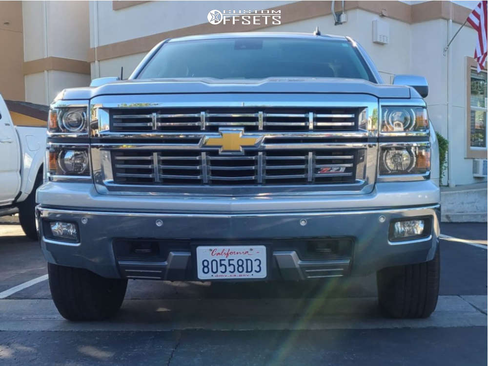2014 Chevrolet Silverado 1500 with 18x9 -12 Method MR305 and 31/8.5R18 ...