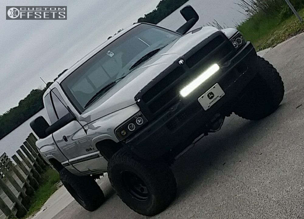 1998 Dodge Ram 1500 with 16x10 -25 Pro Comp 69 and 35/12.5R16 Mickey ...