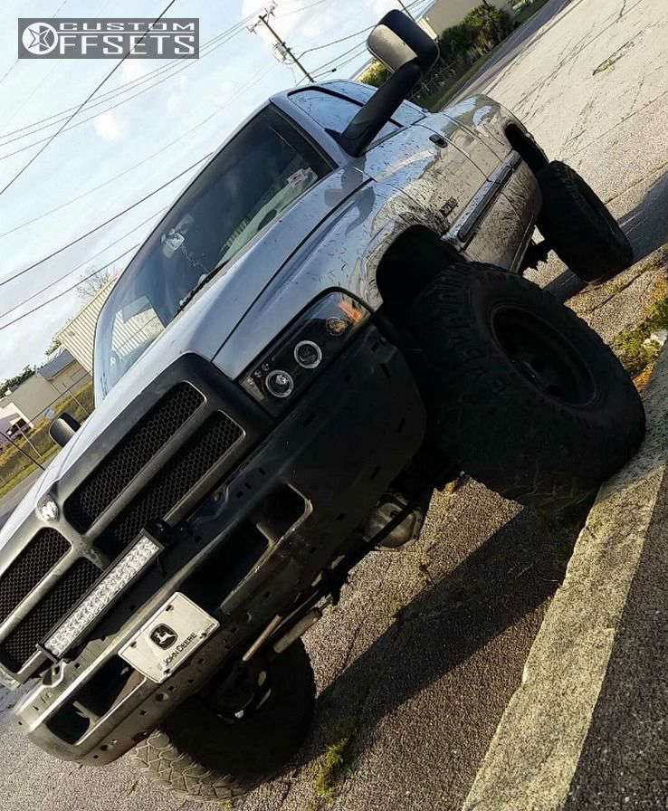 1998 Dodge Ram 1500 with 16x10 -25 Pro Comp 69 and 35/12.5R16 Mickey ...