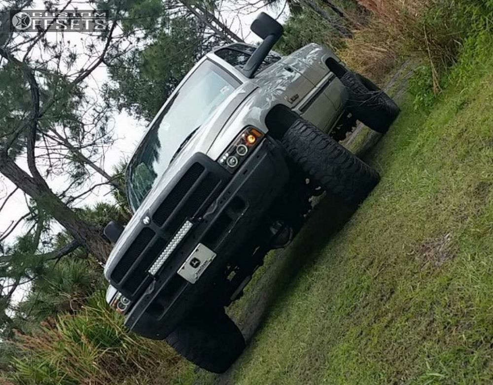 1998 Dodge Ram 1500 with 16x10 -25 Pro Comp 69 and 35/12.5R16 Mickey ...